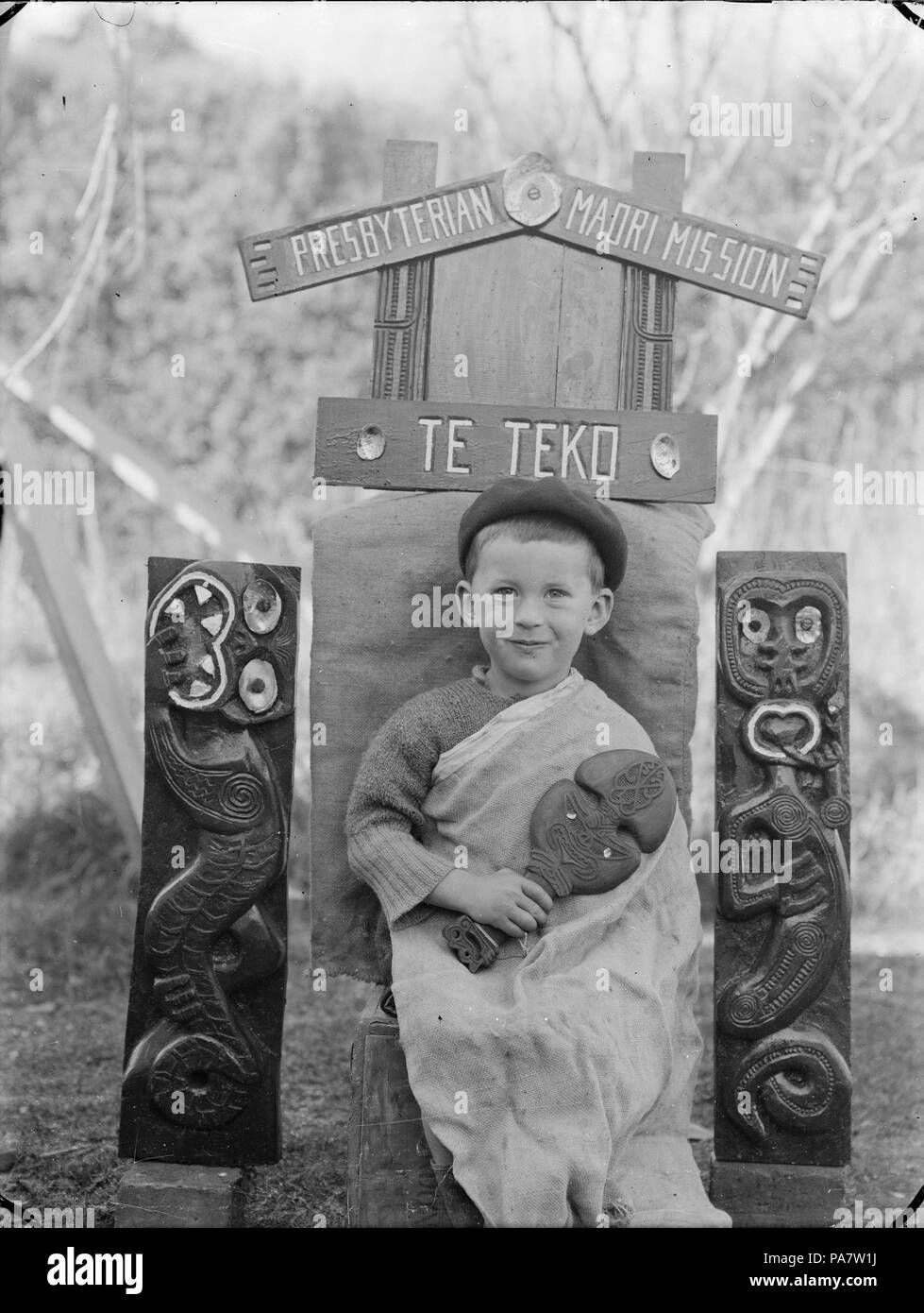 15 Albert Percy Godber's grandson Colin, seated beneath a carved sign ...