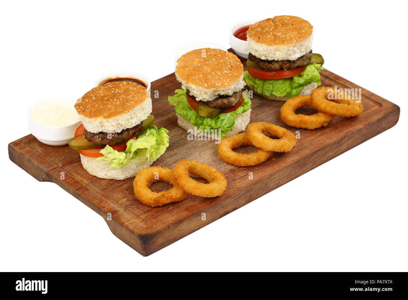 Three mini hamburgers with onion rings Stock Photo - Alamy