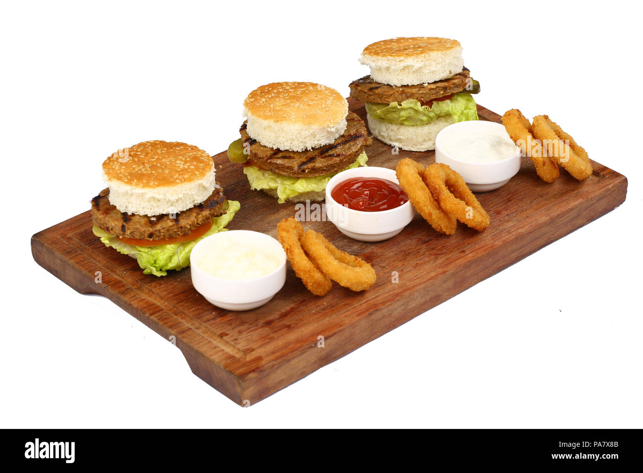 Three mini hamburgers with sauce Stock Photo - Alamy