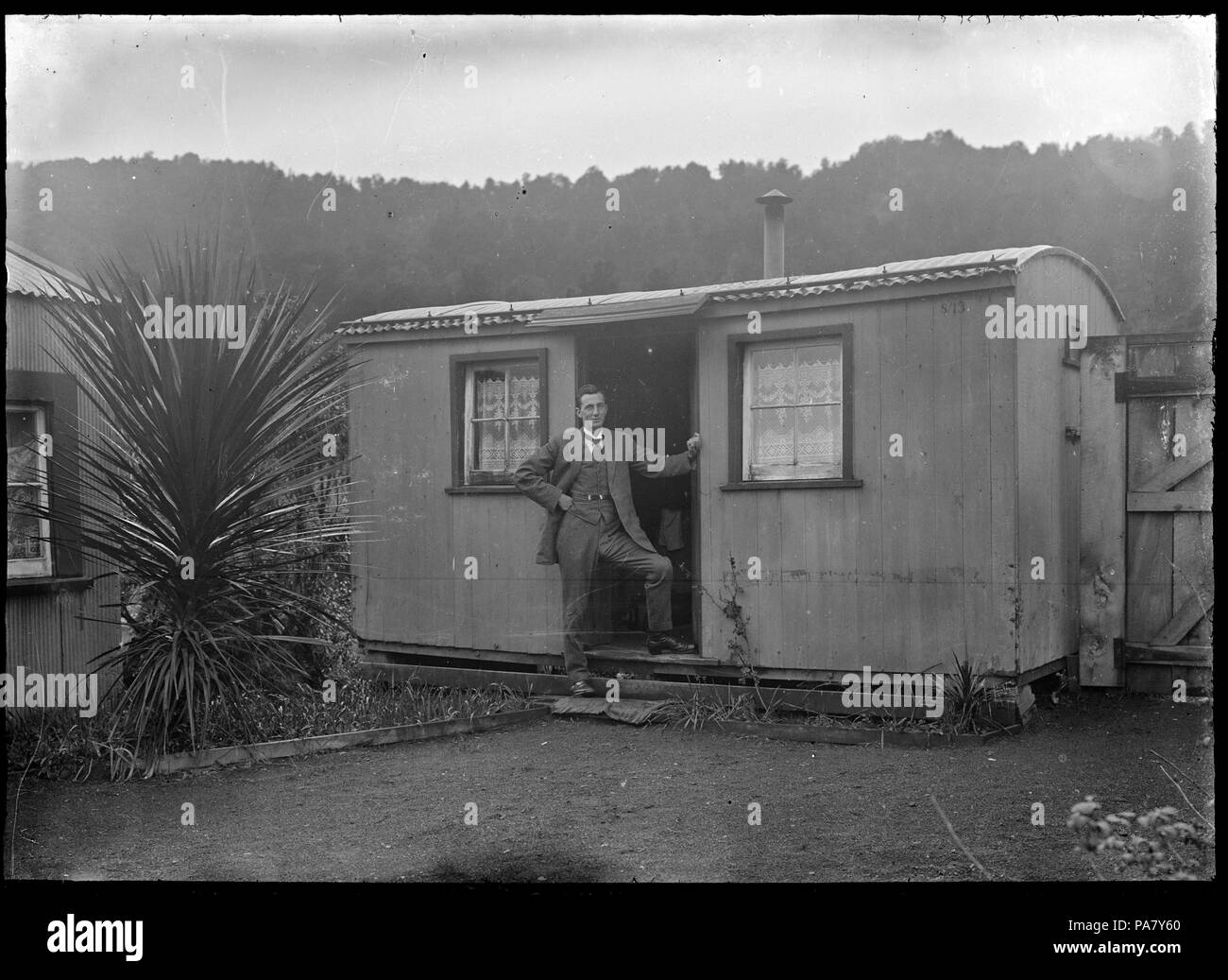 28 Bach at Ohakune, with William Godber standing in the doorway, circa ...