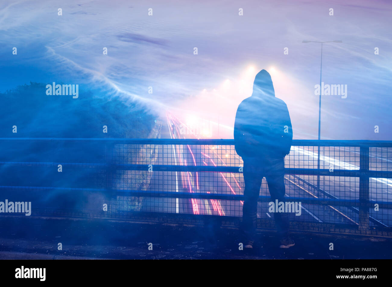 Hooded figure silhouette hi-res stock photography and images - Alamy