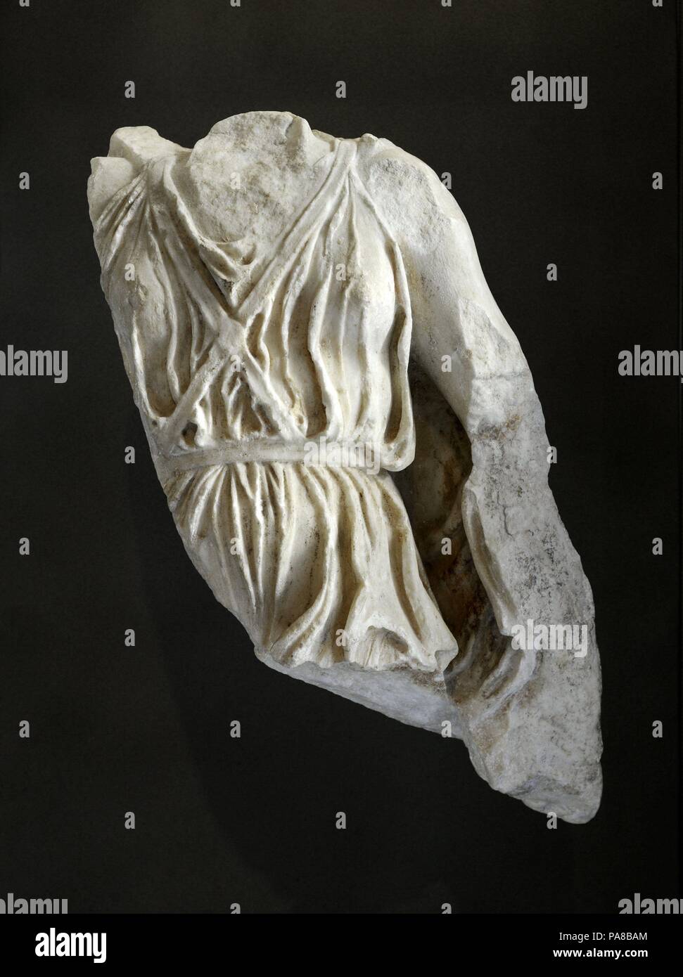 The parapet of the Athena Nike temple. Nike wearing a peplos belted ...