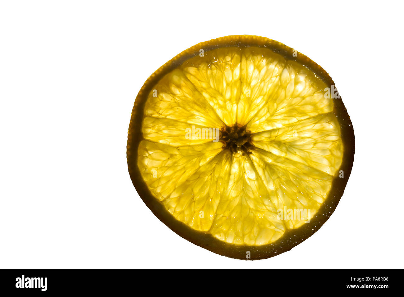 Slices of juicy citric fruit with back light and a white background ...