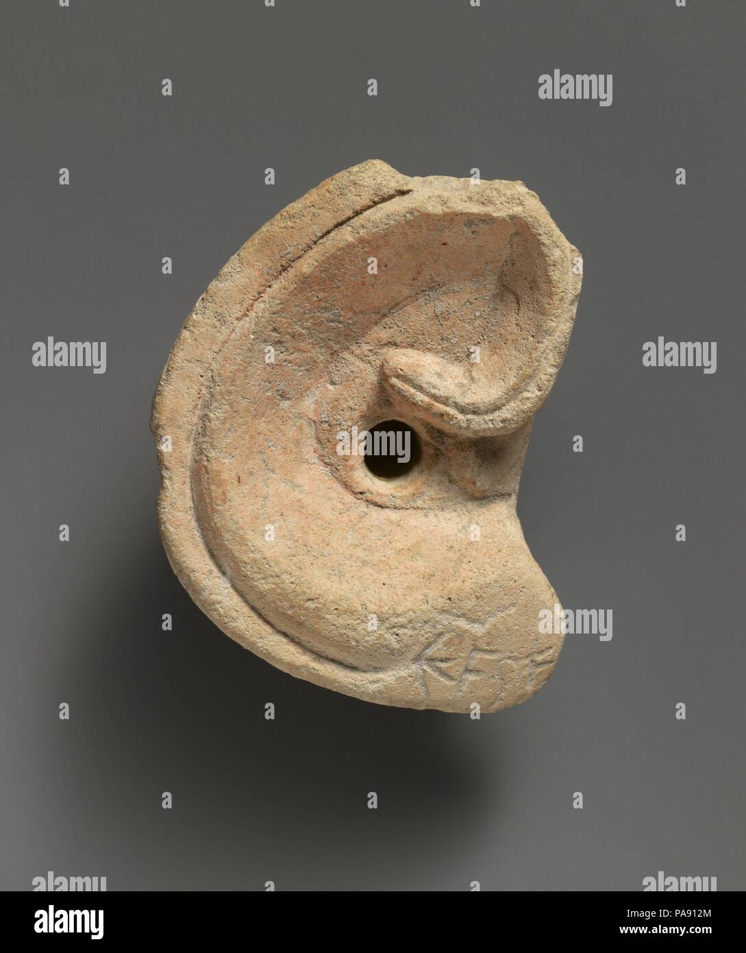 Limestone votive ear. Culture: Cypriot. Dimensions: H. 2 1/2 in. (6.4 ...