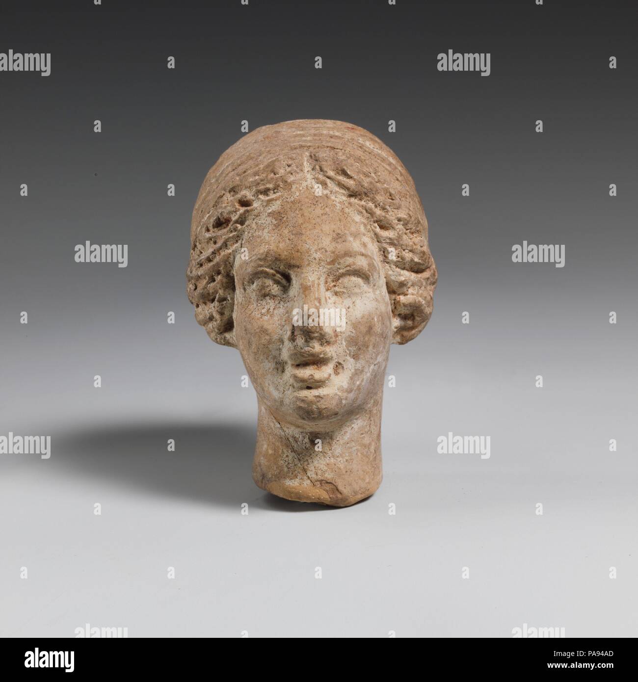 Terracotta head of a woman. Culture: Greek, South Italian ...