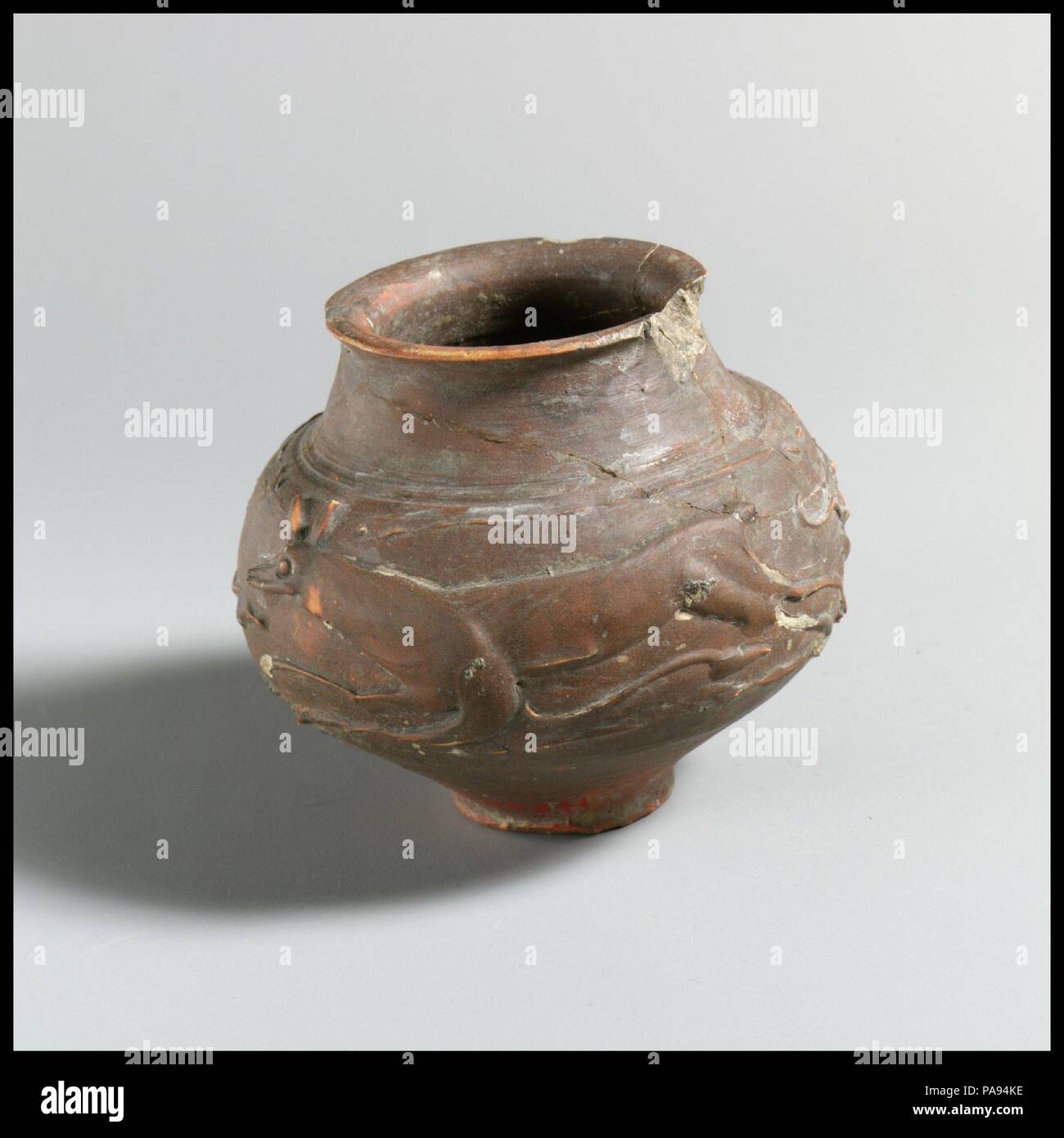Terracotta beaker with barbotine decoration. Culture: Roman. Dimensions ...