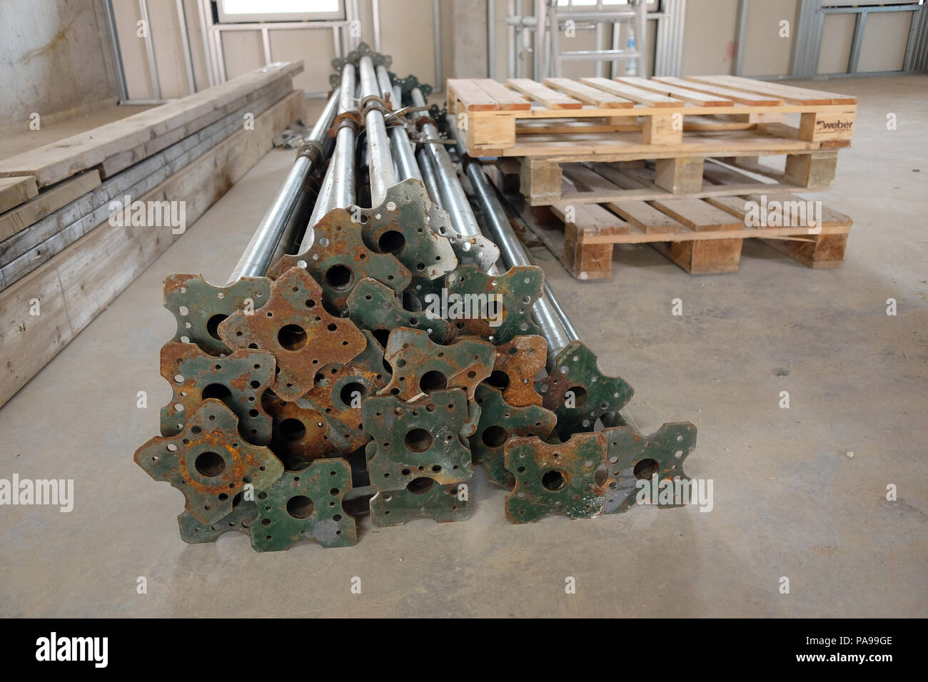 July 208 - Stack of newly delivered temporary support props on a ...