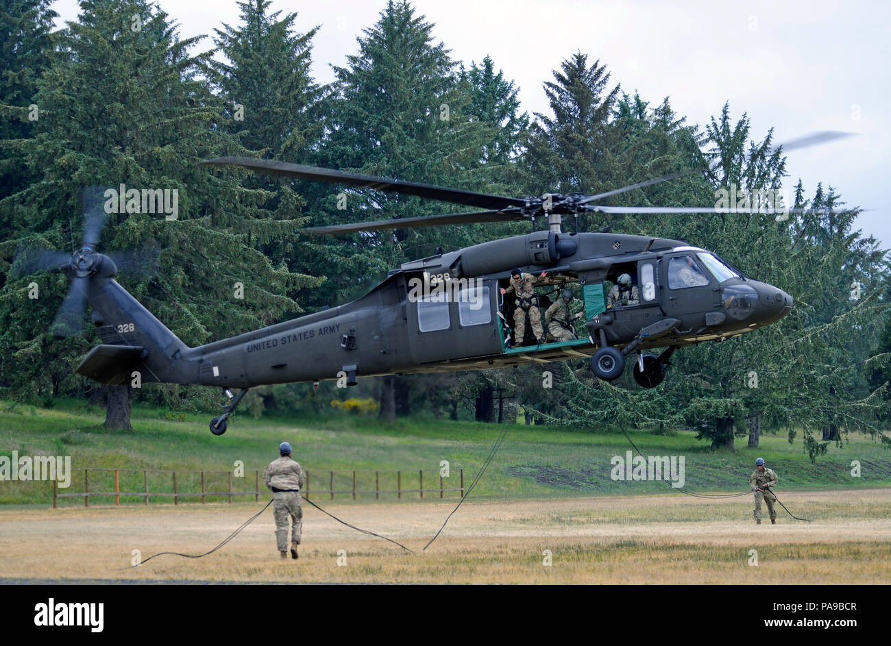 An Oregon Army National Guard HH-60M Black Hawks helicopter takes off ...