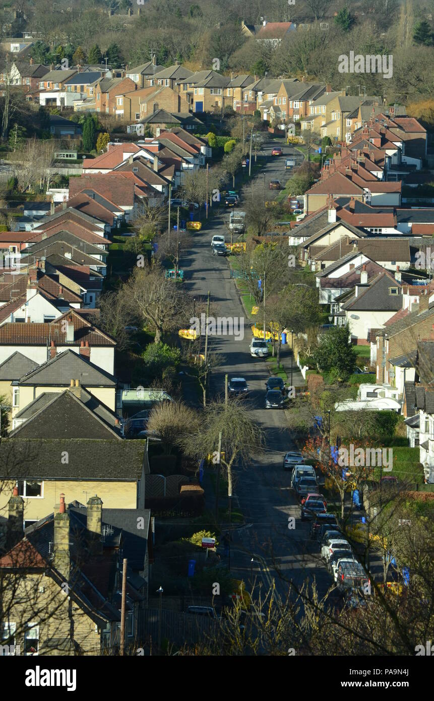 View over the rooftops of a typical residential street in the city of ...
