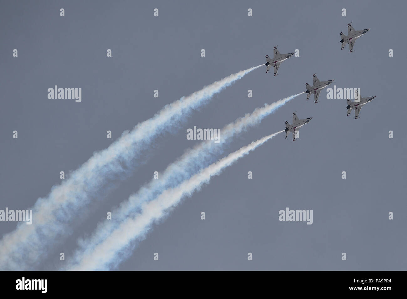 The Thunderbirds pilots perform the 5-Card Loop maneuver during the ...