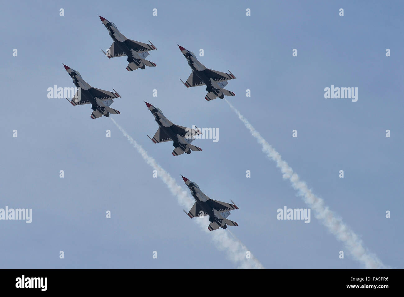 The Thunderbirds pilots perform the Stinger formation during the ...