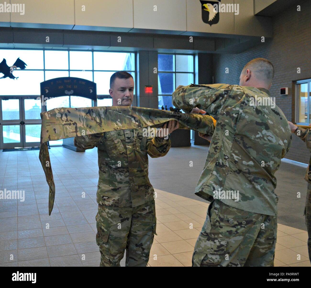 Soldiers, friends and family members gather at Fort Campbell, Ky., to ...