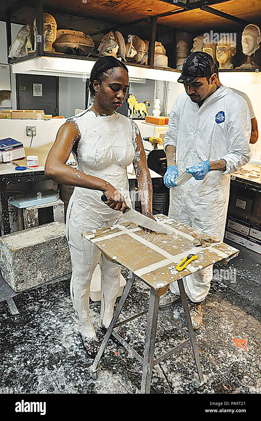 Culinary Specialist Sgt. 1st Class Stephanie Owens ensures the proper ...