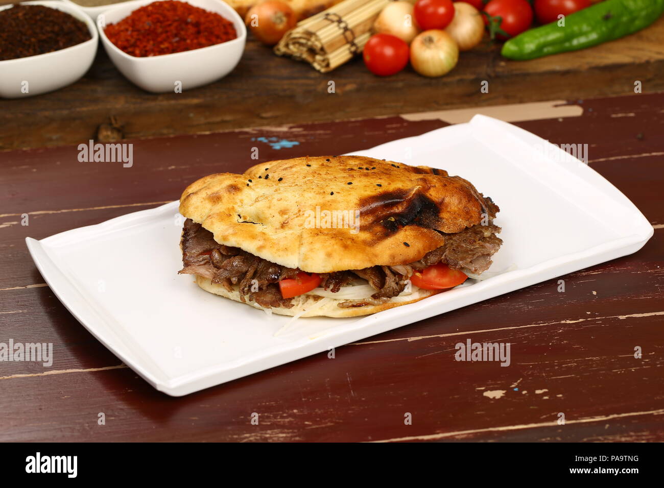 Turkish doner kebab shawarma in pita bread sandwich Stock Photo - Alamy