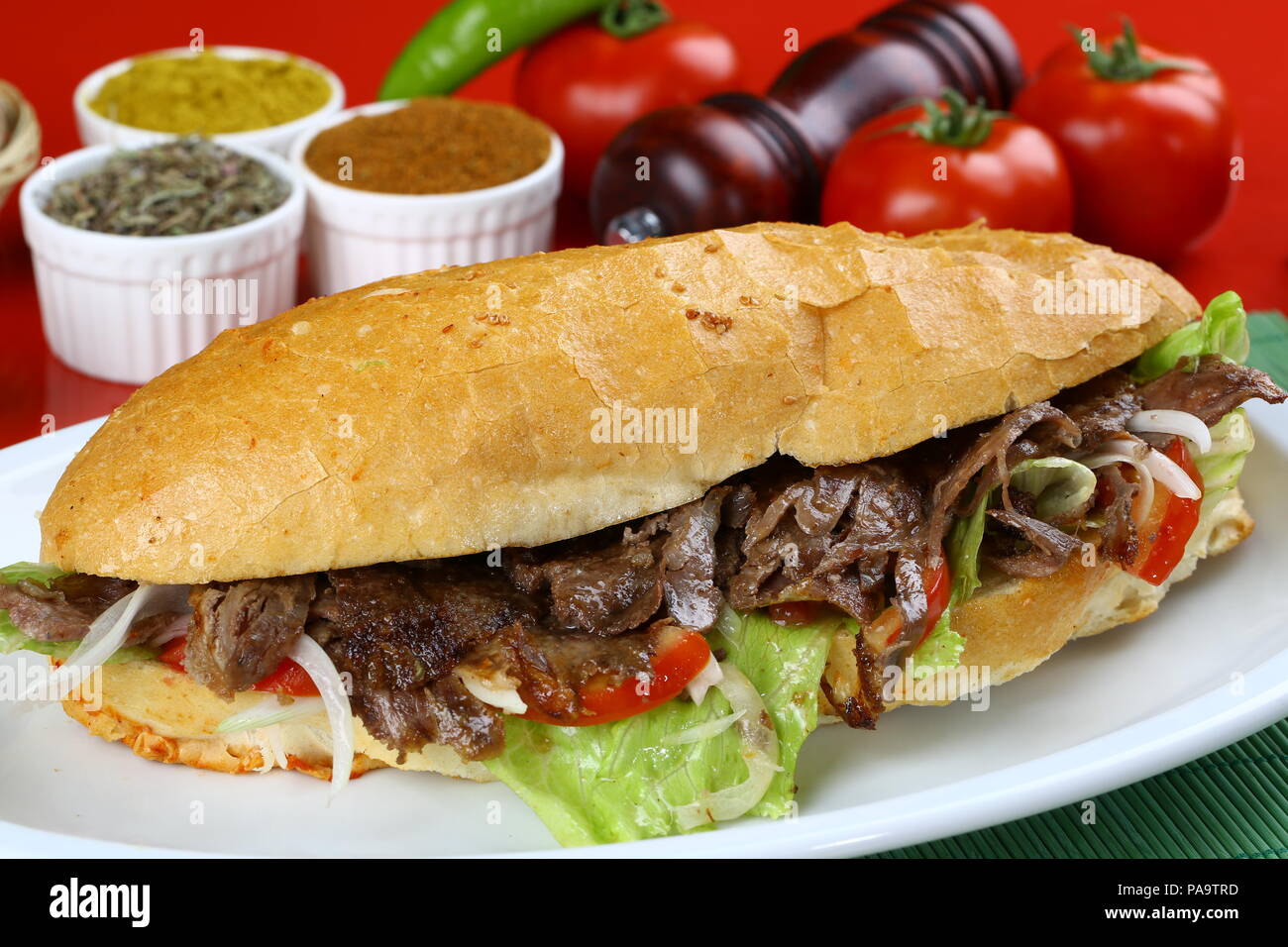 Traditional Turkish doner kebab shawarma in bread sandwich Stock Photo ...