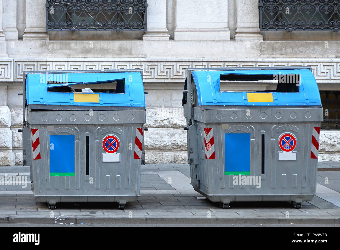 Two recycling bins for sorting municipal waste Stock Photo - Alamy