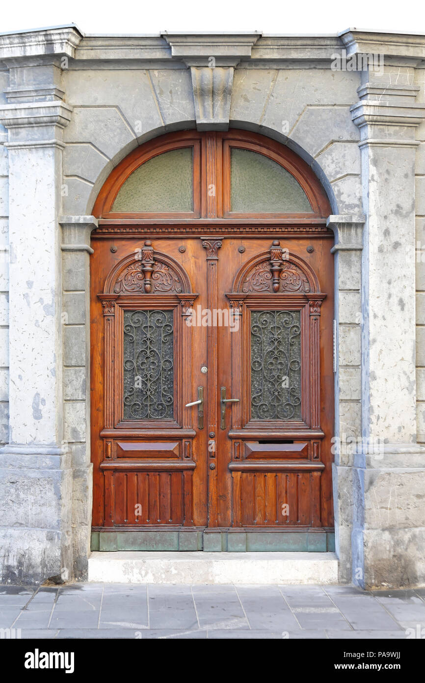 Double wooden door with arch Stock Photo - Alamy