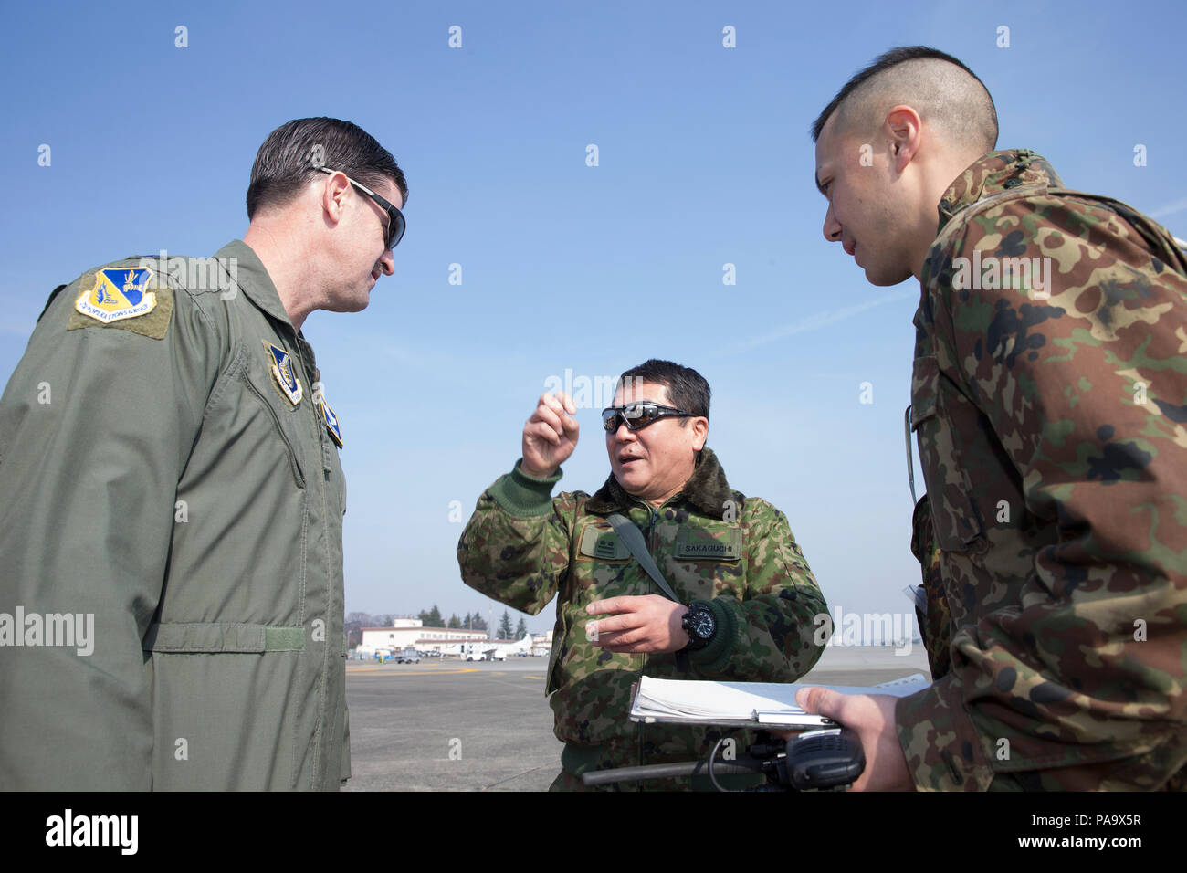 (Center and left) Japan Ground Self-Defense Force Lt. Col. Tatsuro ...