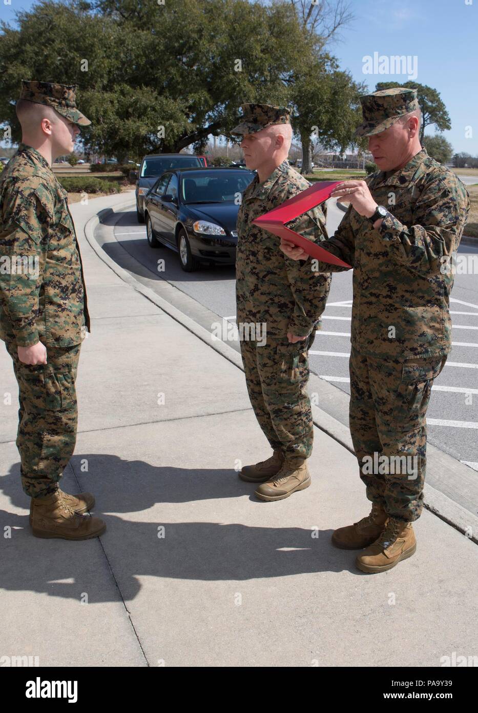 U.S. Marine Corps Sgt. Maj. Paul A. Berry, right, sergeant major of ...