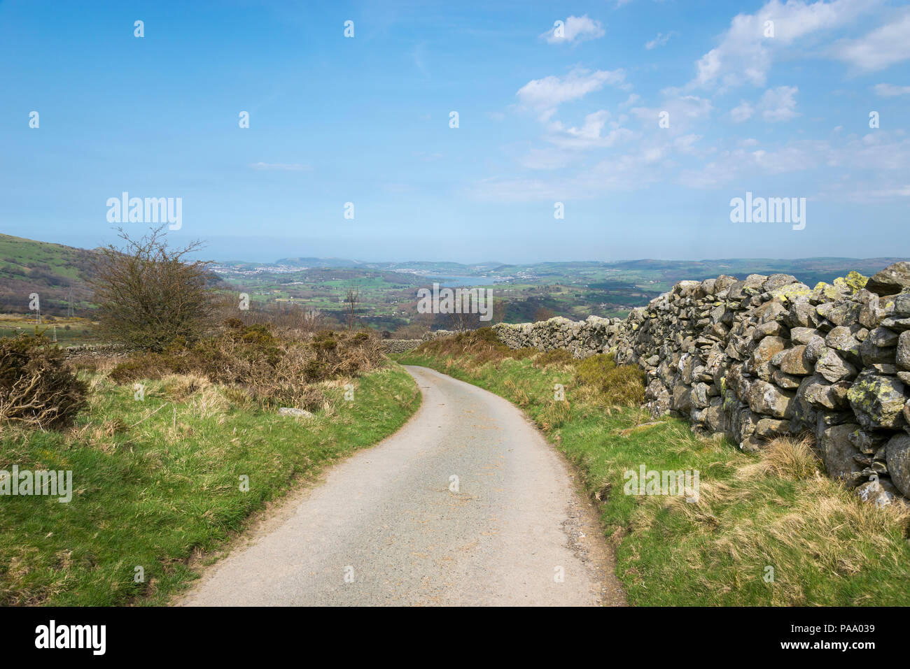 Narrow country road high in the hills above the Conwy Valley in North ...