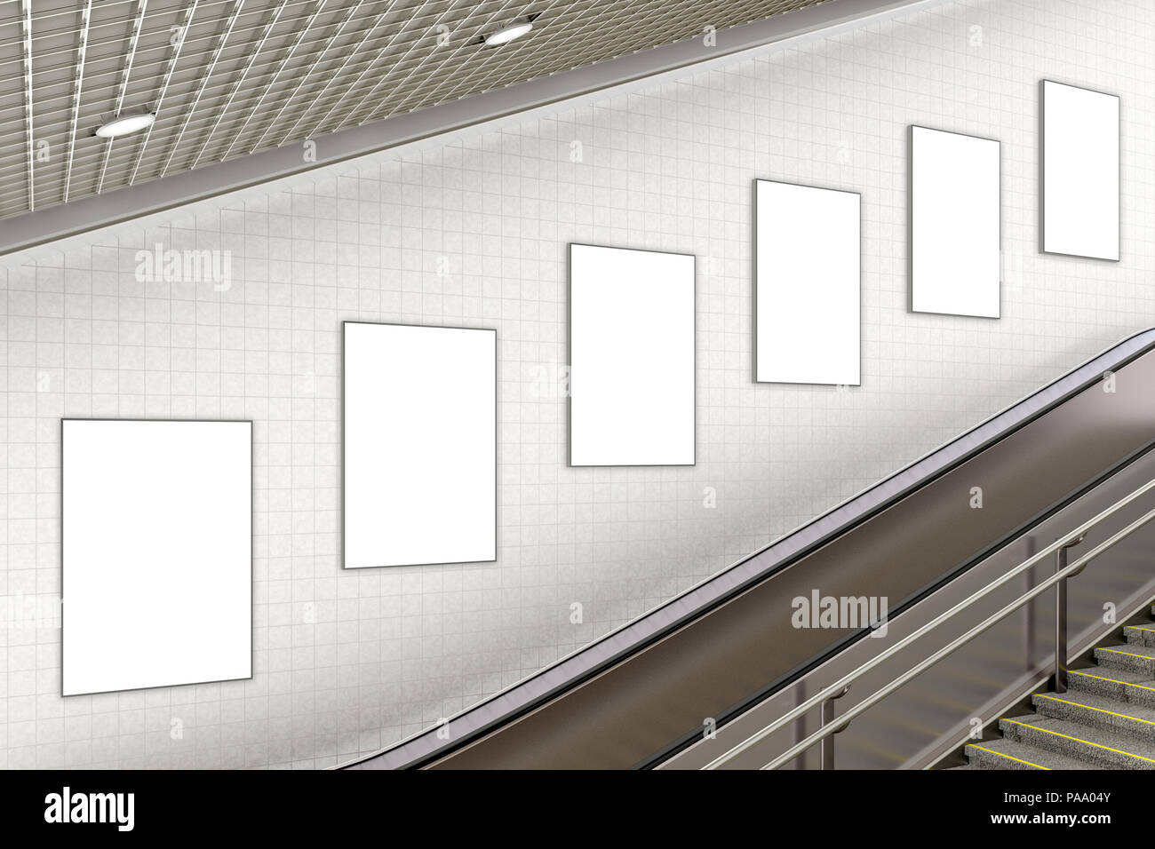 Line of blank vertical advertising posters on wall of underground ...
