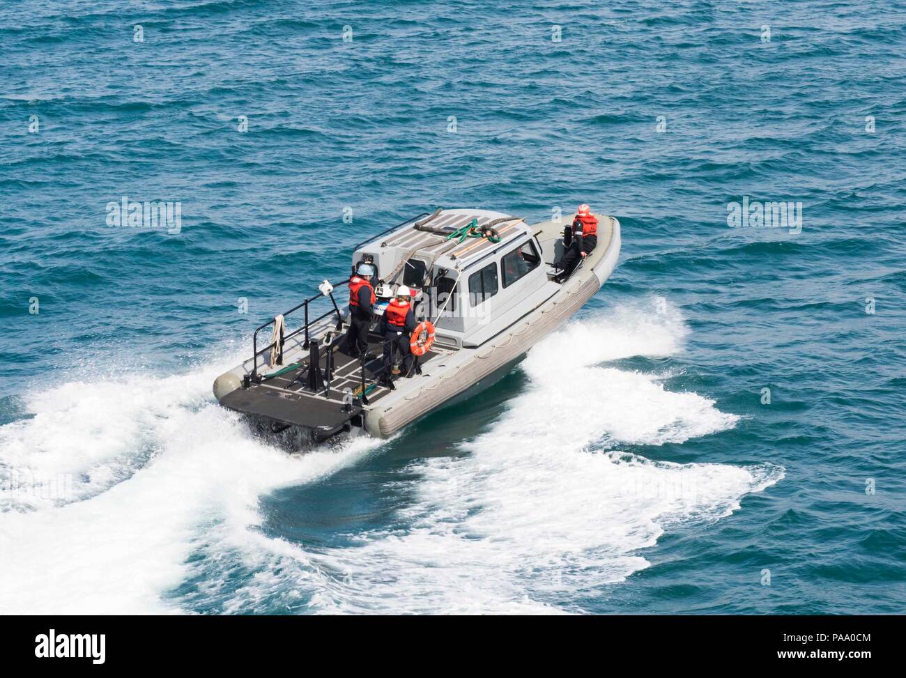 Closed cabin rigid inflatable boat hi-res stock photography and images ...