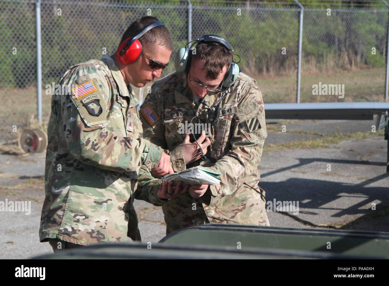 Sgt. Justin Carrington (left) and Spc. David Fournier (right), both ...