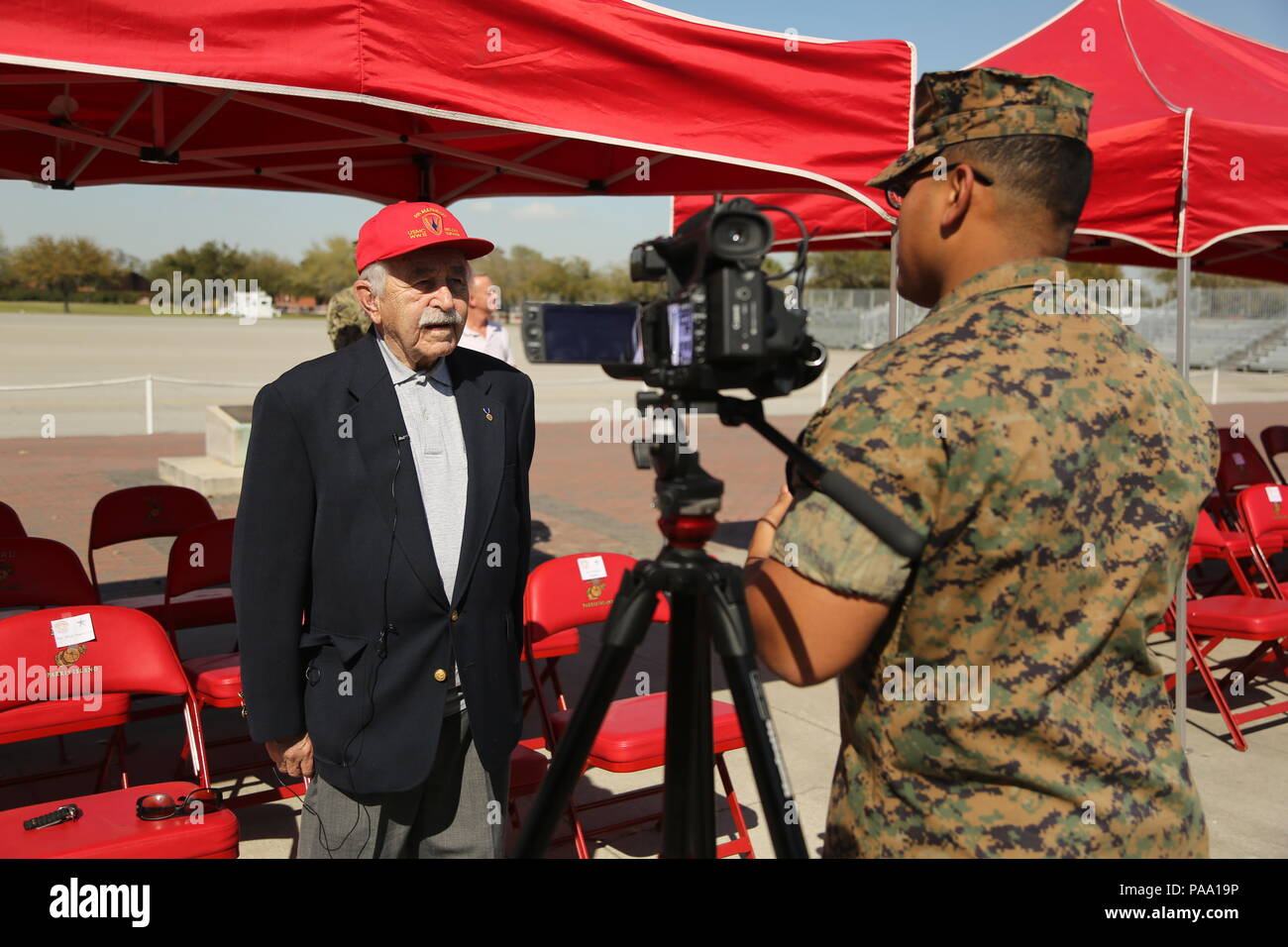 U.S. Marine Corps Lance Cpl. Raphael Rodriguez, a combat videographer ...