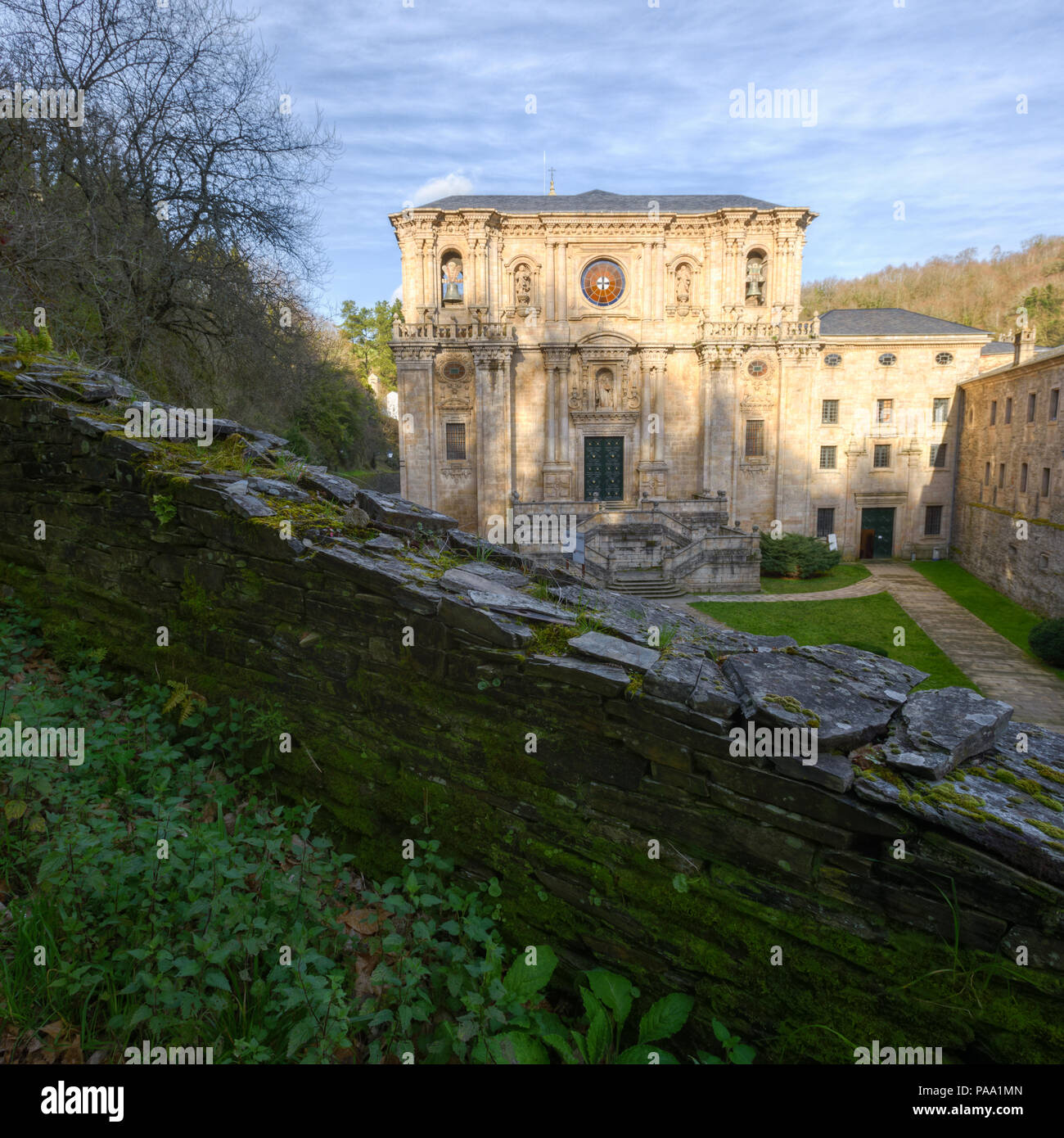 Stone wall in front of the Benedictine monastery of St. Julian of Samos ...