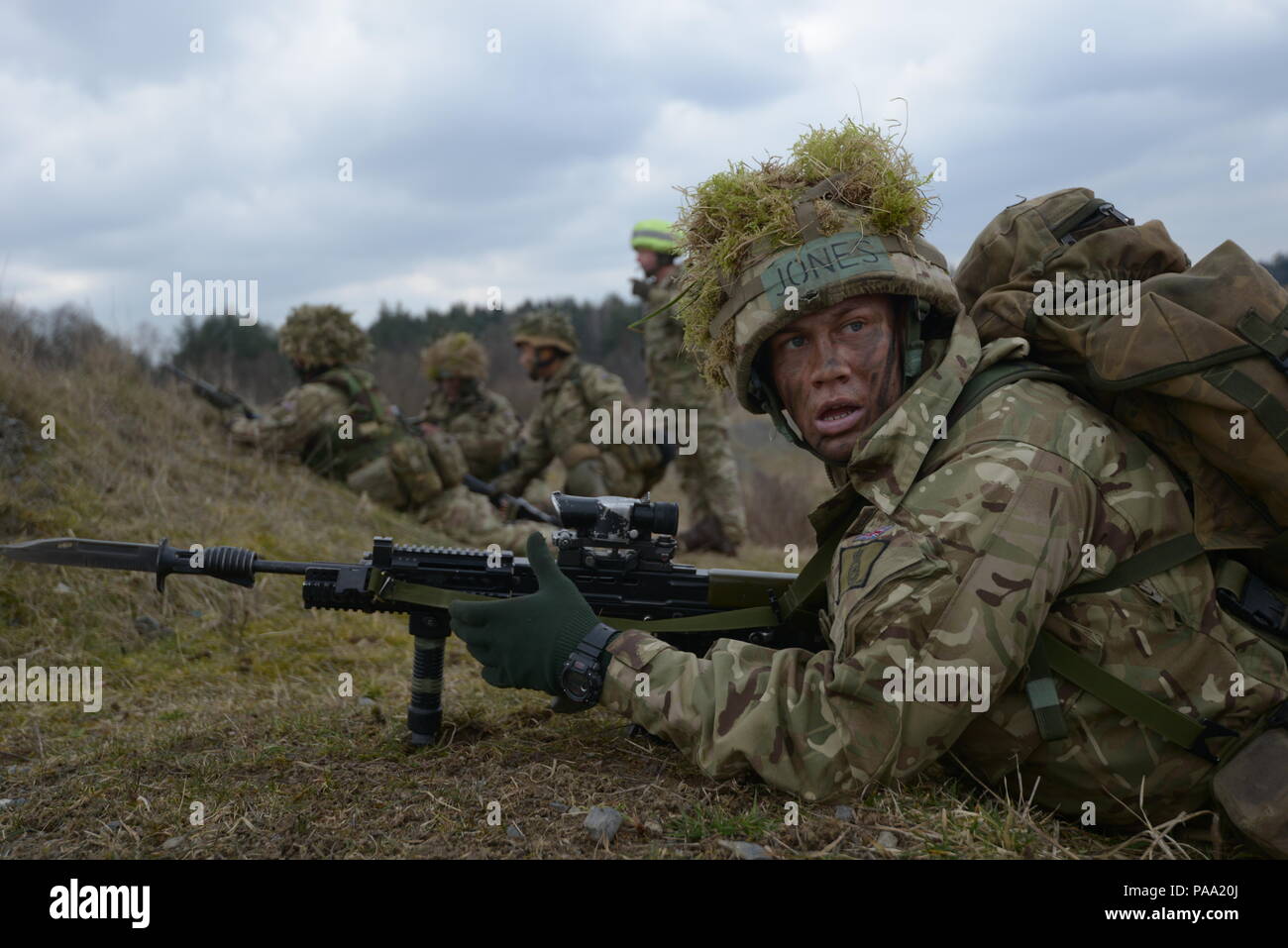 A British cadet of the Royal Military Academy Sandhurst receives ...