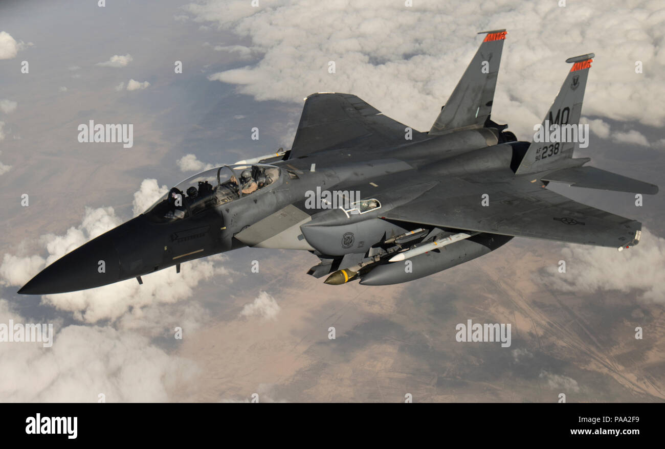 A U.S Air Force F-15 Strike Eagle flies over Iraq, March 17, 2016 in ...