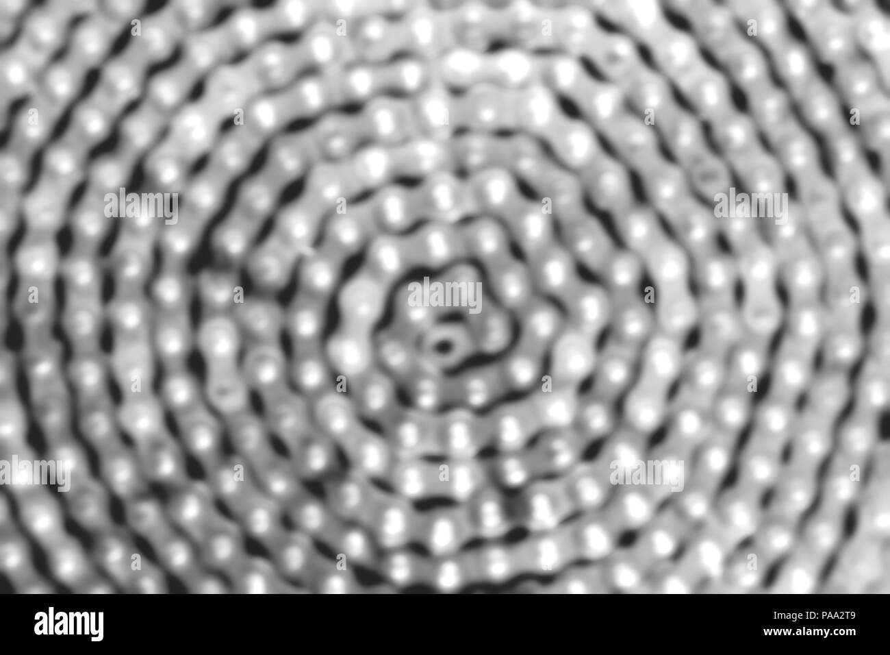 Abstract blur background of roller chain. Top view. Black and white ...
