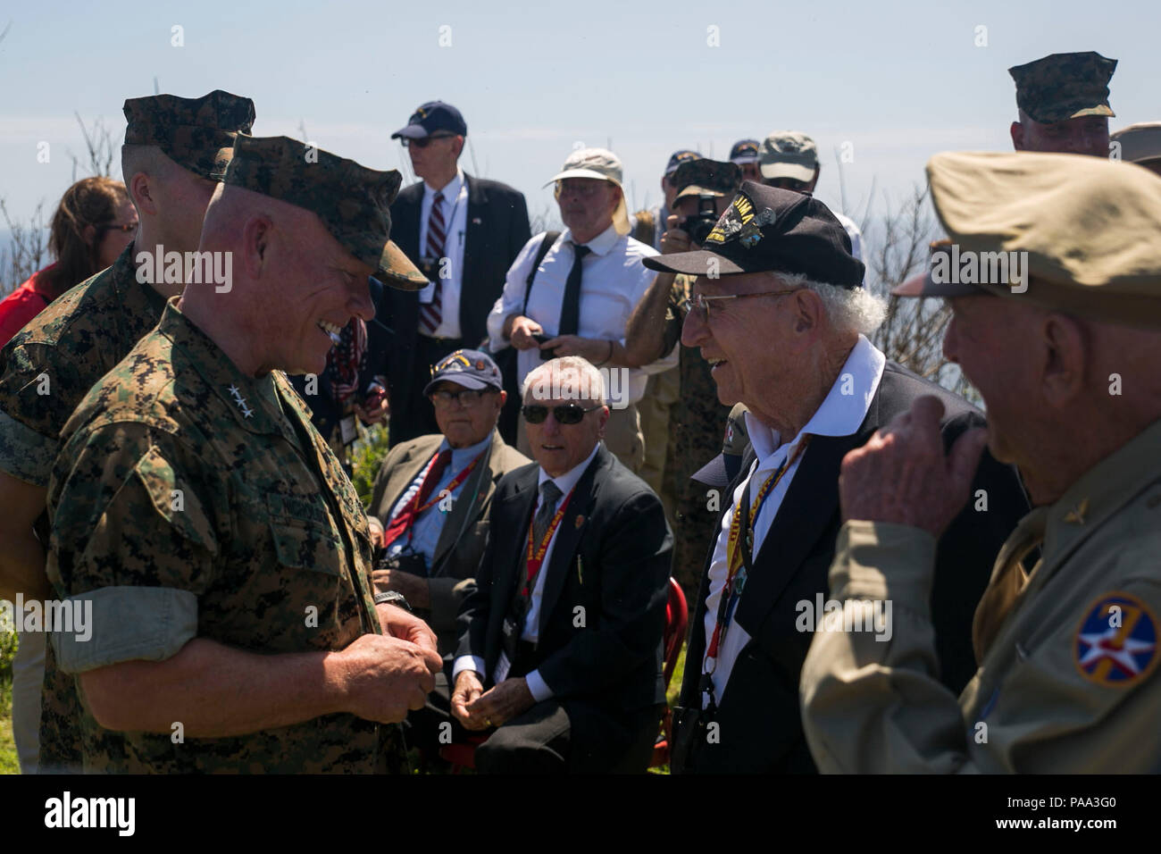Lt. Gen. Lawrence Nicholson talks with U.S. Navy Seabee Jack Lazere, a ...