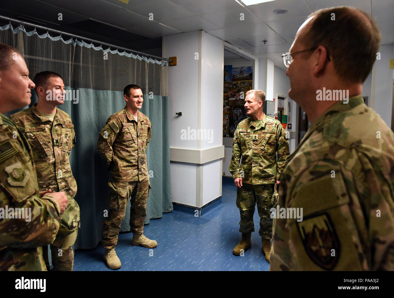 Chaplain (Maj. Gen.) Dondi Costin, Air Force Chief of Chaplains (center), engages with 455th ...