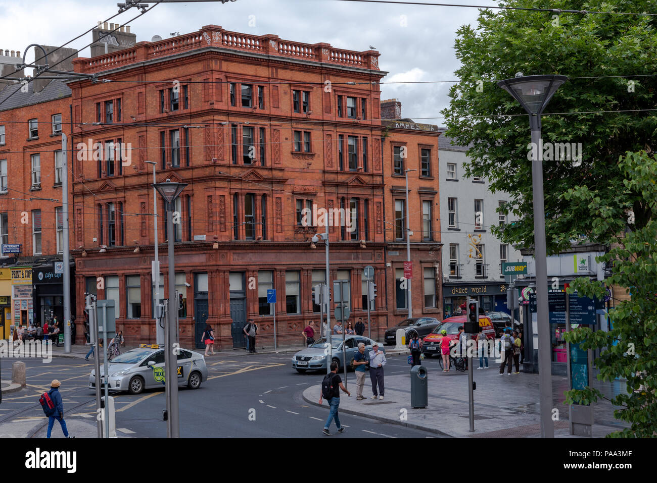 A busy street corner in Dublin, Ireland Stock Photo - Alamy