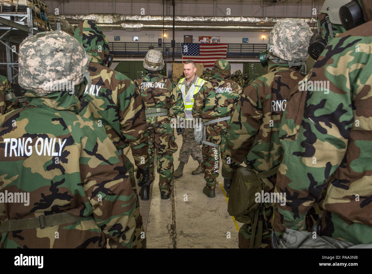 Staff Sgt. Seth L. Schoenfeld, center, Readiness and Emergency ...