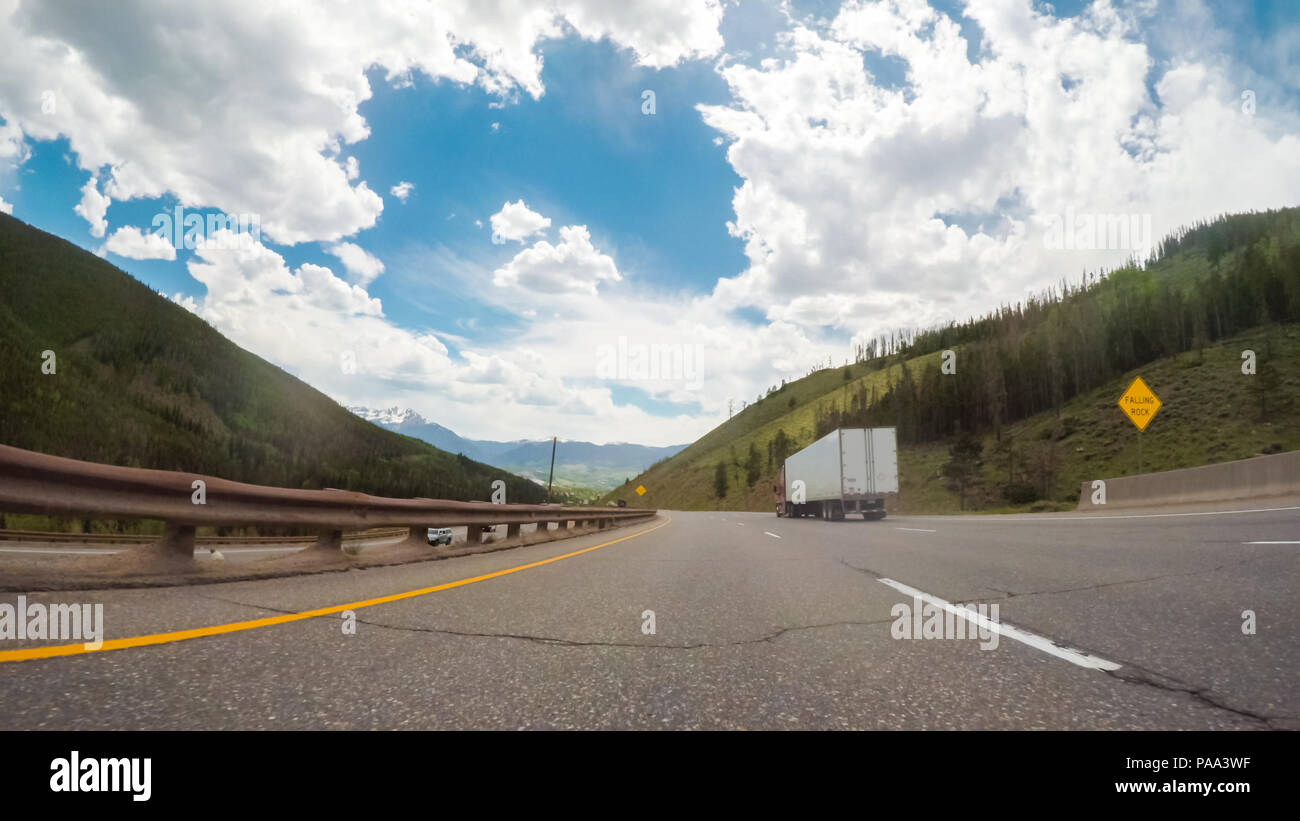 Semi truck driving through the mountains hi-res stock photography and ...