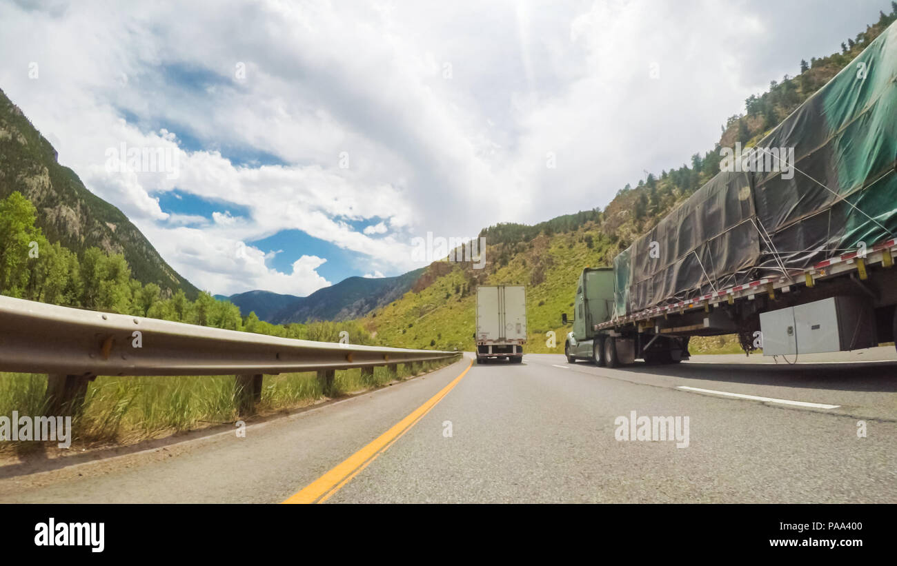 Driving West through the mountains on interstate highway I70 Stock ...