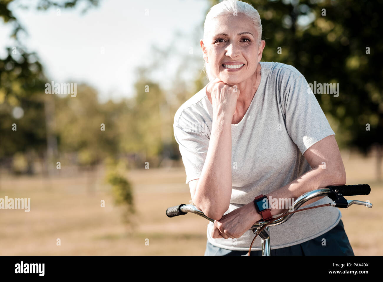 Positive delighted woman enjoying sport Stock Photo - Alamy