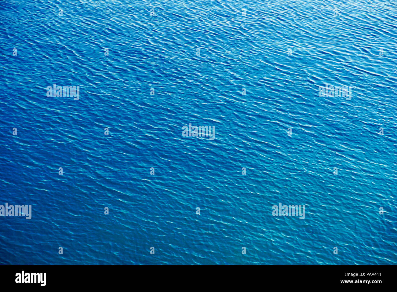 Sea surface with small waves in Adriatic sea, big background in blue ...
