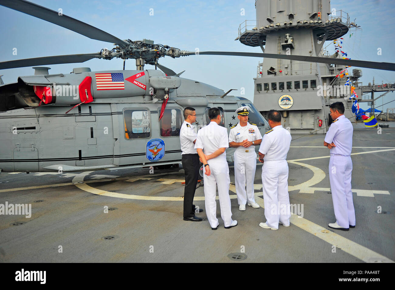 160319-N-TV402-008 SINGAPORE (March 19, 2016) Commanding officer of the ...