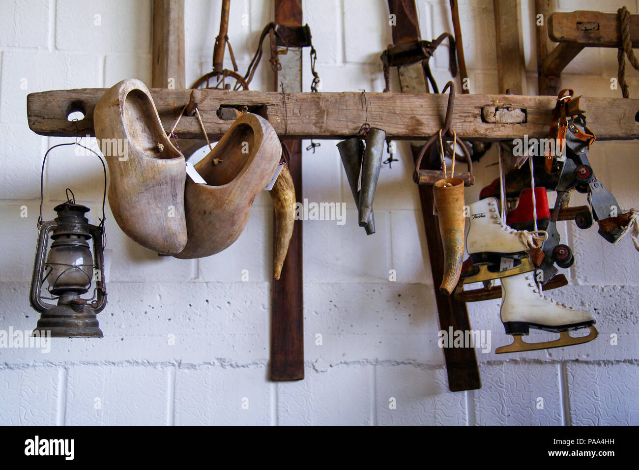 Vintage objects hanging on the wall, group of object Stock Photo - Alamy
