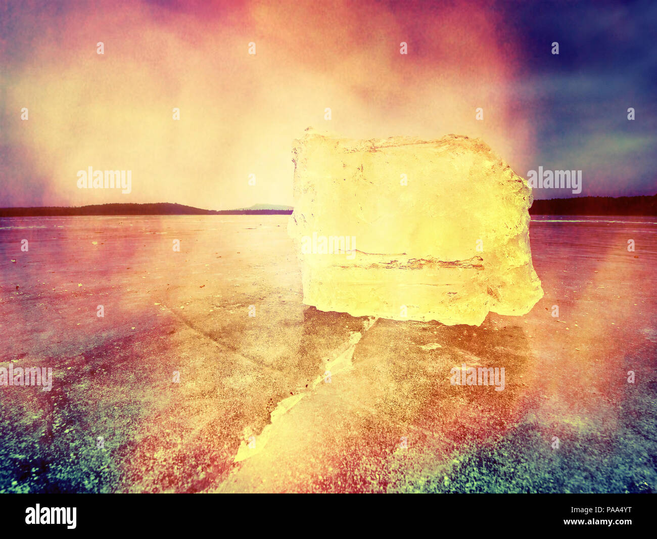 Symbol of harsh winter. The rays of the sun form rainbow shadows in the ...