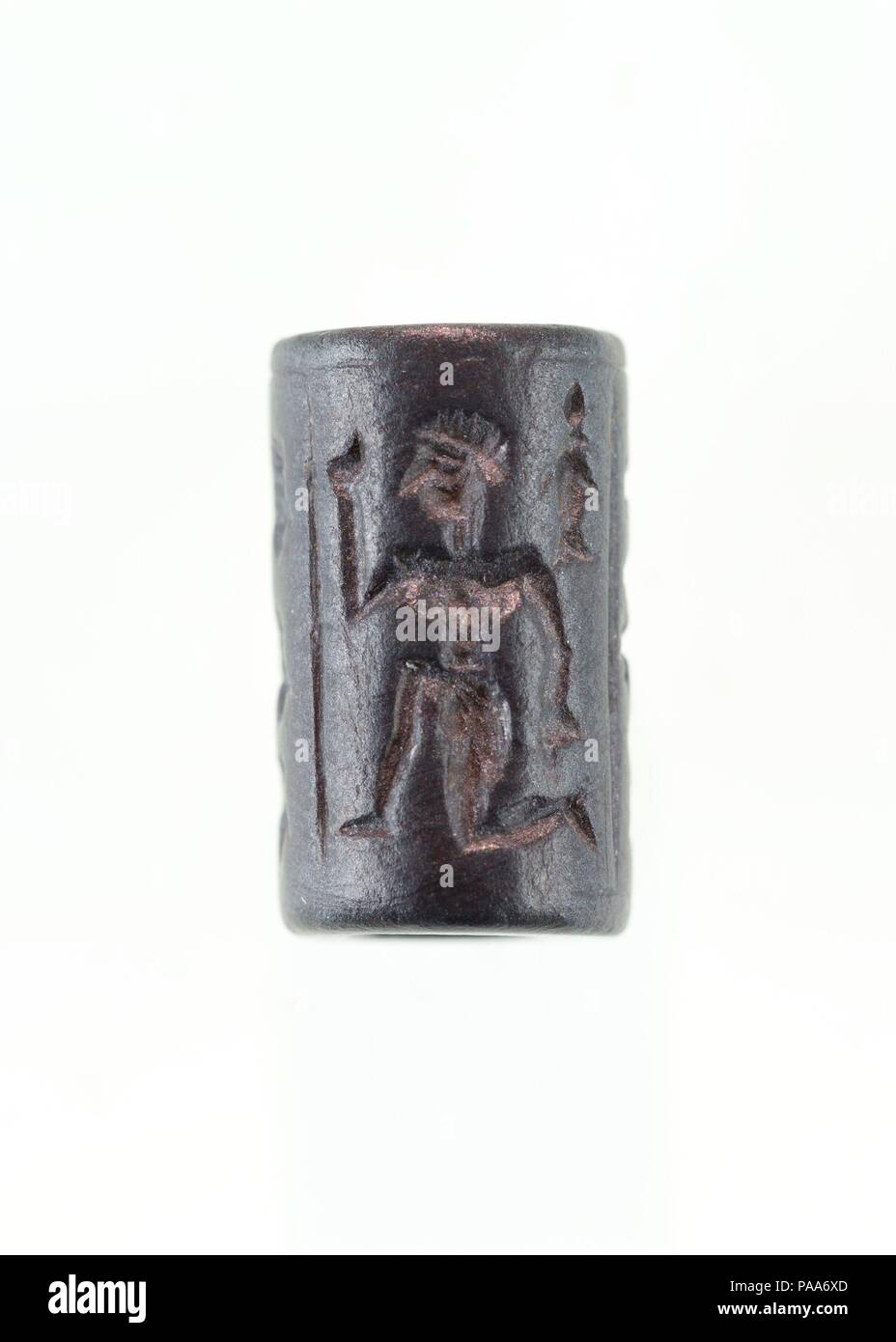 Cylinder seal. Dimensions: L. 1.4 cm (9/16 in.); Diam. 0.8 cm (5/16 in ...