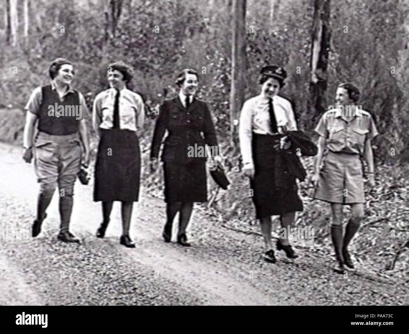 161 Lower Plenty, VIC. WAAAF members walking along a country road ...