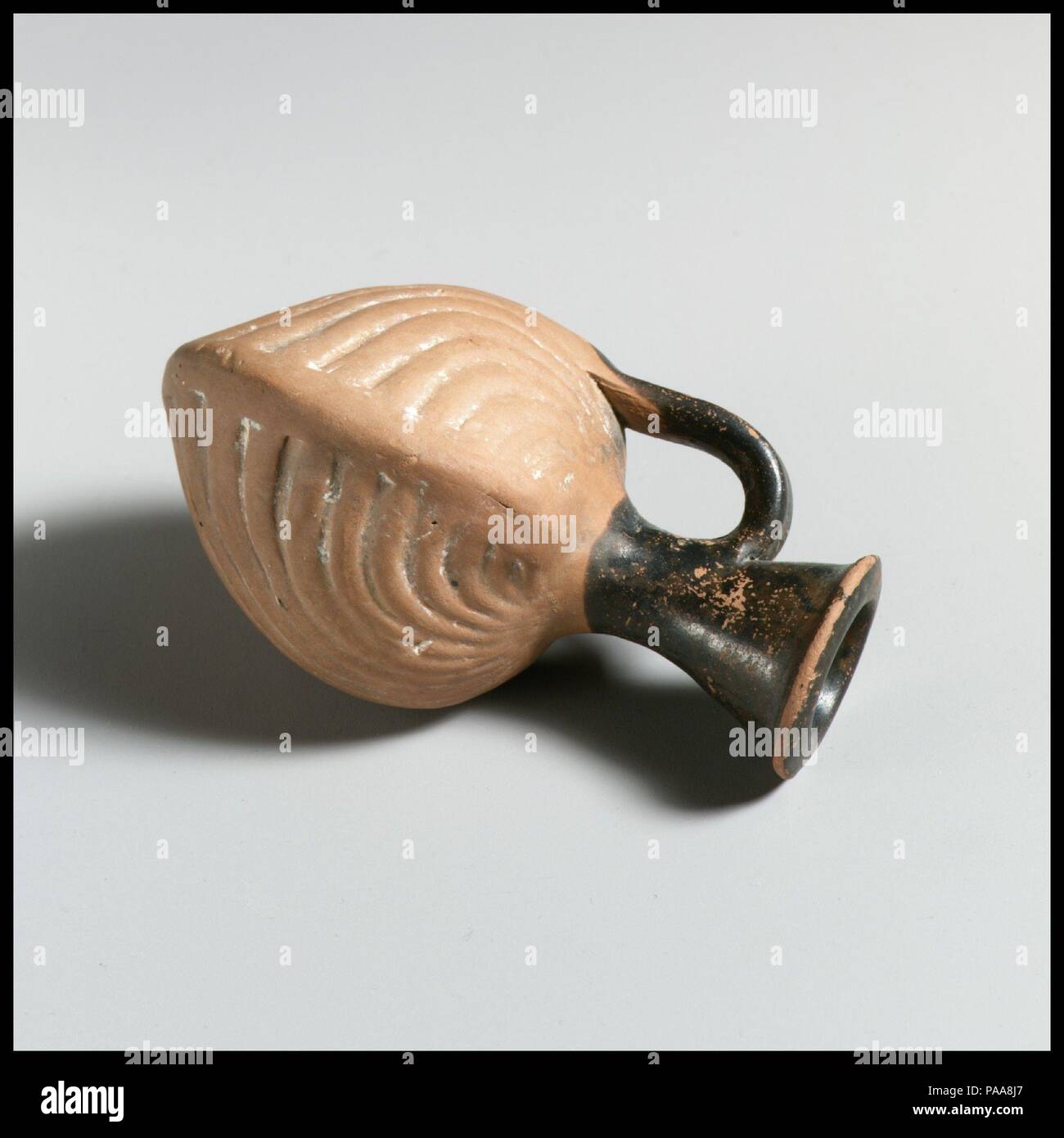 Terracotta vase in the form of two cockle shells. Culture: Greek, Attic ...