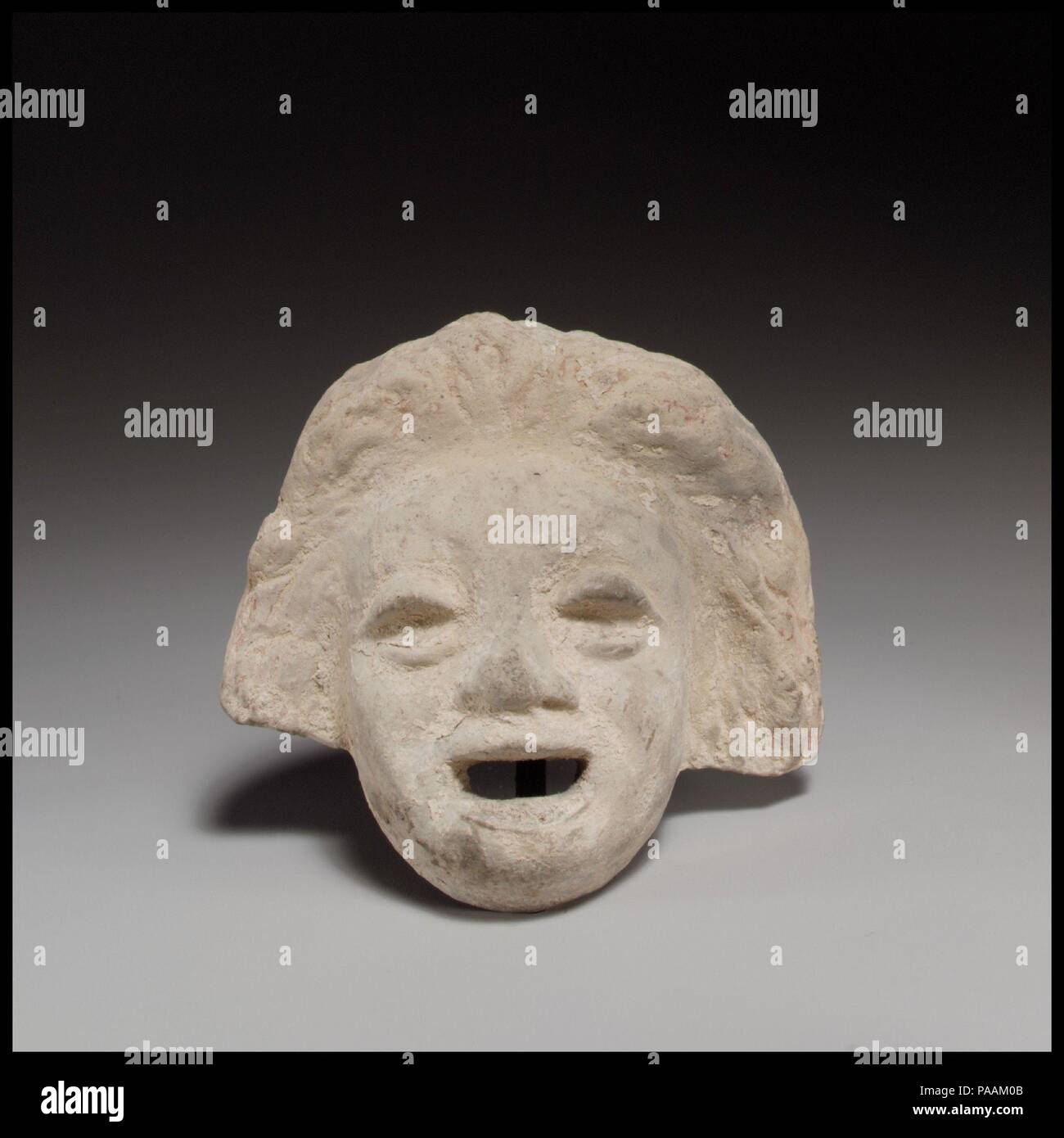 Terracotta comic mask hi-res stock photography and images - Alamy