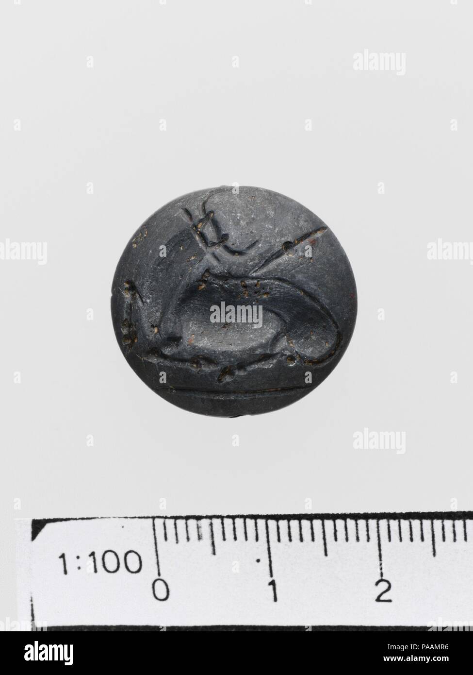 Haematite lentoid seal. Culture: Minoan. Dimensions: Diameter 2.1-2.2 ...