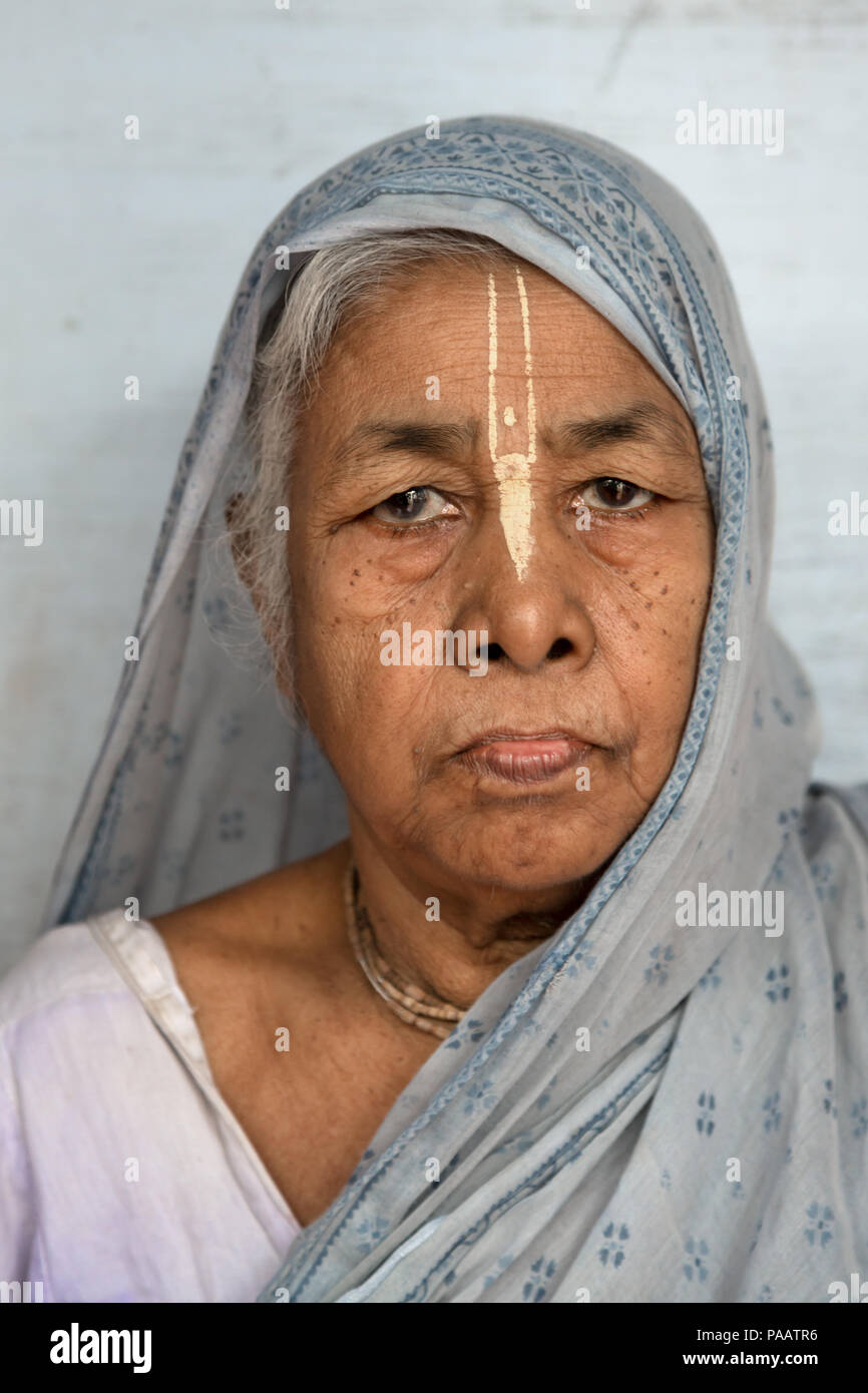 Portrait of Hindu widow woman living in an ashram in Vrindavan , India ...