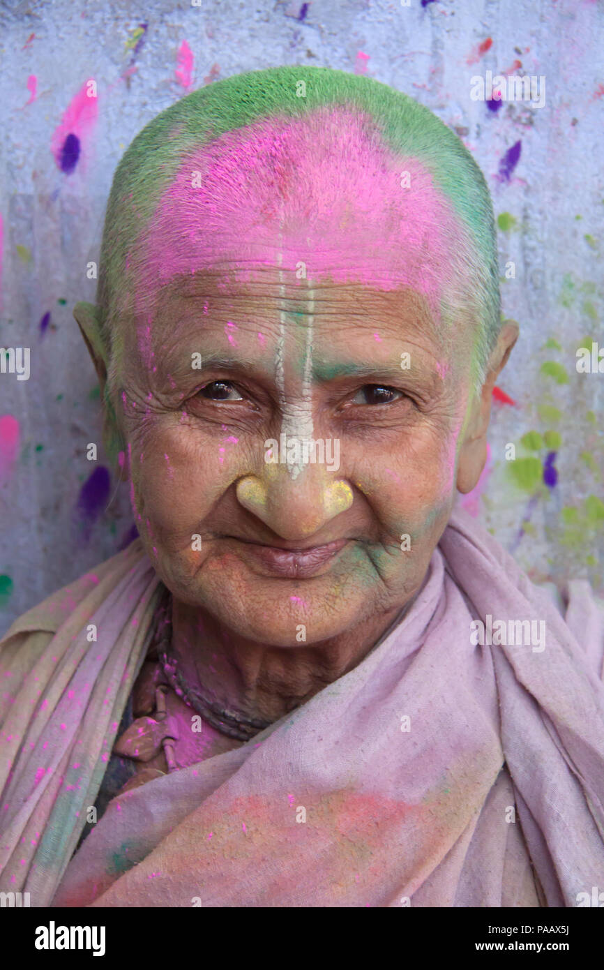 Portrait of Hindu widow woman during Holi living in an ashram in ...